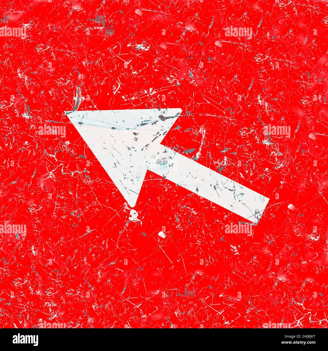 Old damaged and scratched metal road sign with white arrow on red ...