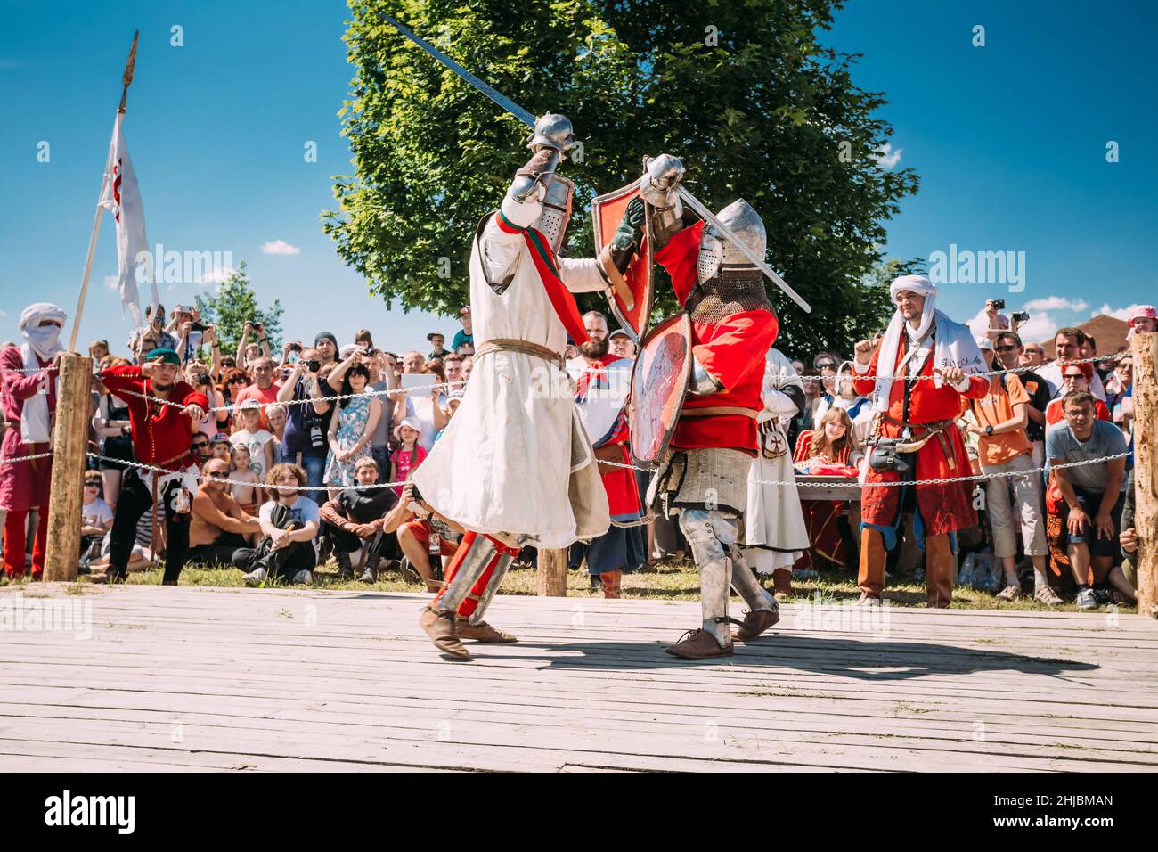 Knights In Fight With Sword. Restoration Of Knightly Battle Stock Photo ...