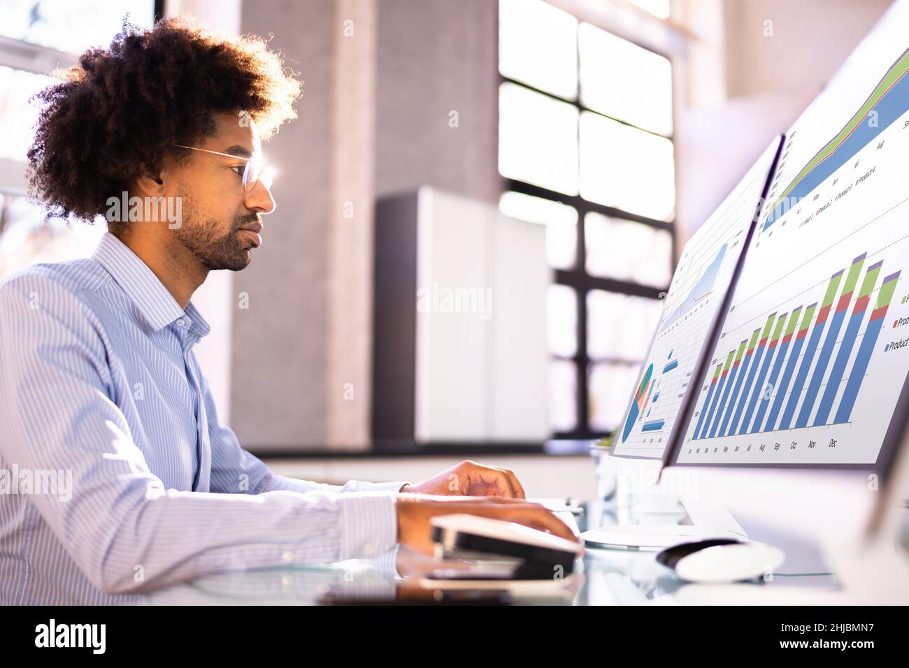 African American Business Man Analyst Using Data Analytics Stock Photo ...