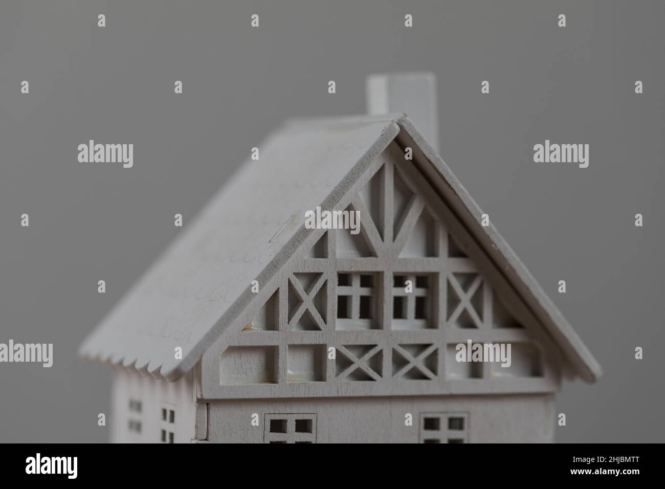 Closeup of a small wooden house with white background Stock Photo - Alamy