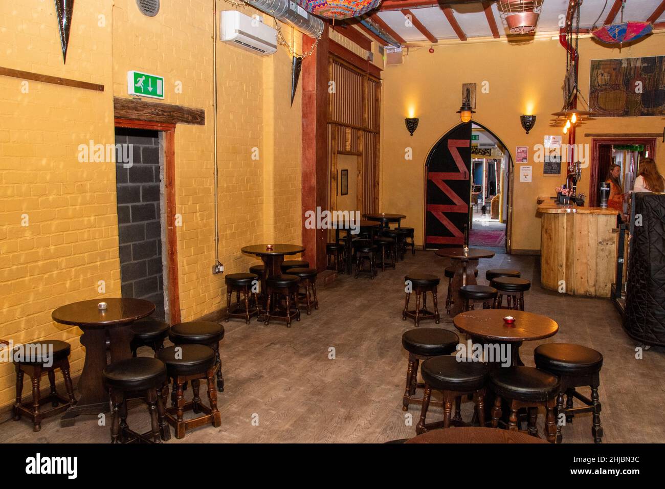 Sheffield, UK - June 22: chairs and tables at the bar of the event space for hire at Yellow Arch ...