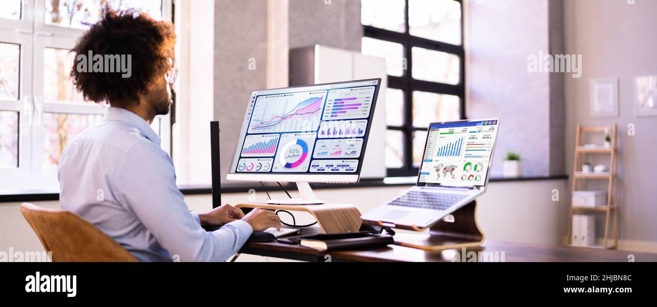 African American Data Analyst Using Data Analytics KPI Dashboard Stock ...