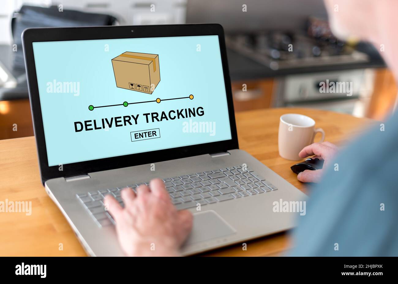 Man using a laptop with delivery tracking concept on the screen Stock ...