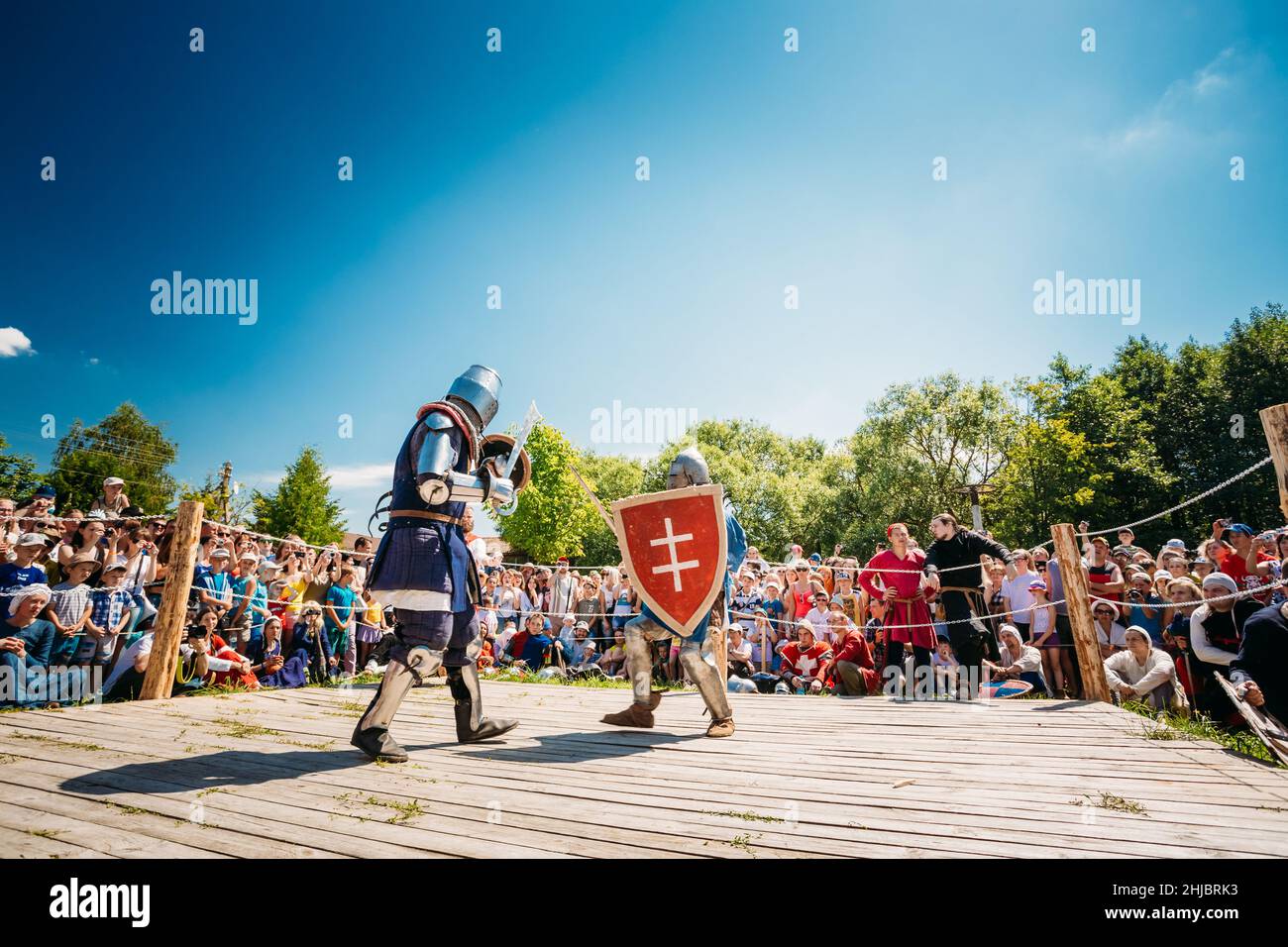 Knights In Fight With Sword. Restoration Of Knightly Battle Stock Photo ...