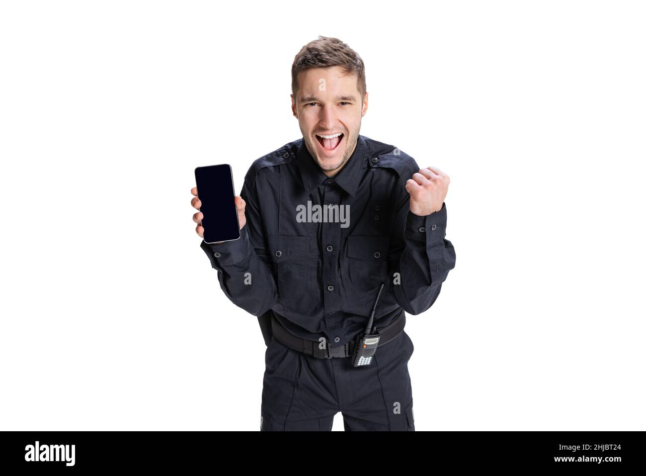 Portrait of young man, policeman officer wearing black uniform using ...