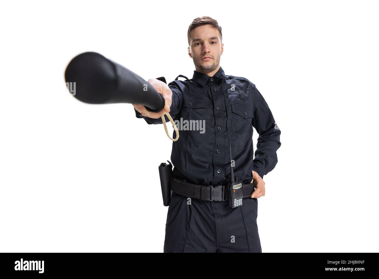 Front camera view. Young male policeman officer wearing black uniform ...