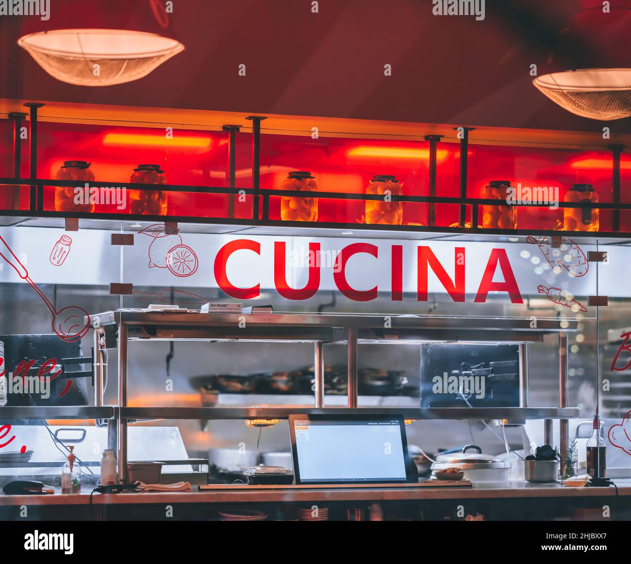 Open kitchen in Cucina restaurant in Miami Florida midtown at night ...