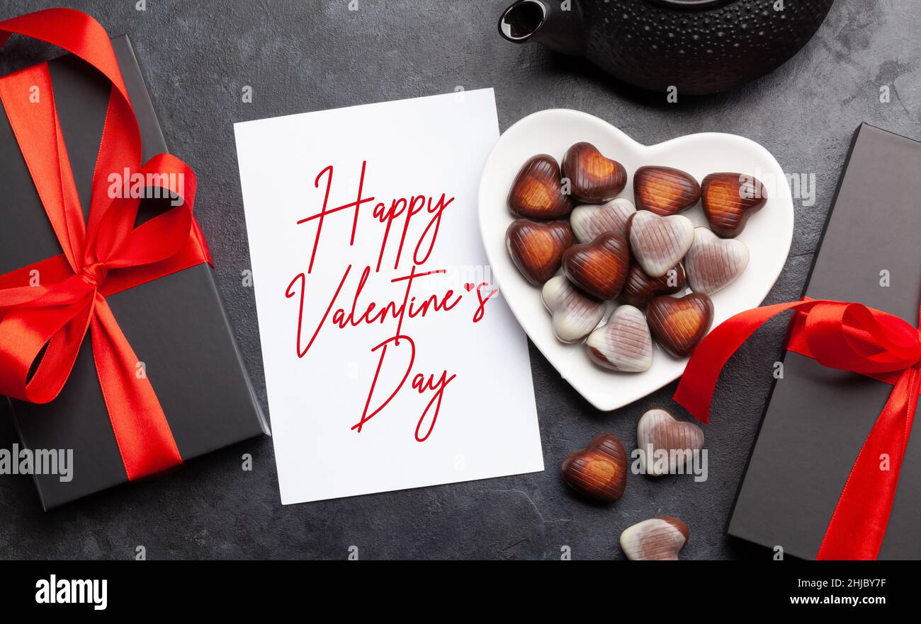 Valentines day heart shaped chocolate sweets and gift boxes. Top view ...