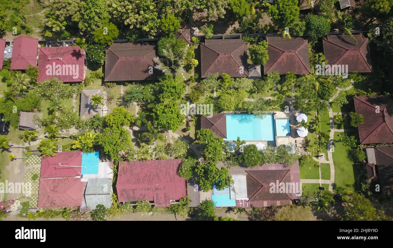 Aerial view of beautiful isolated villa with small swimming pool in the ...