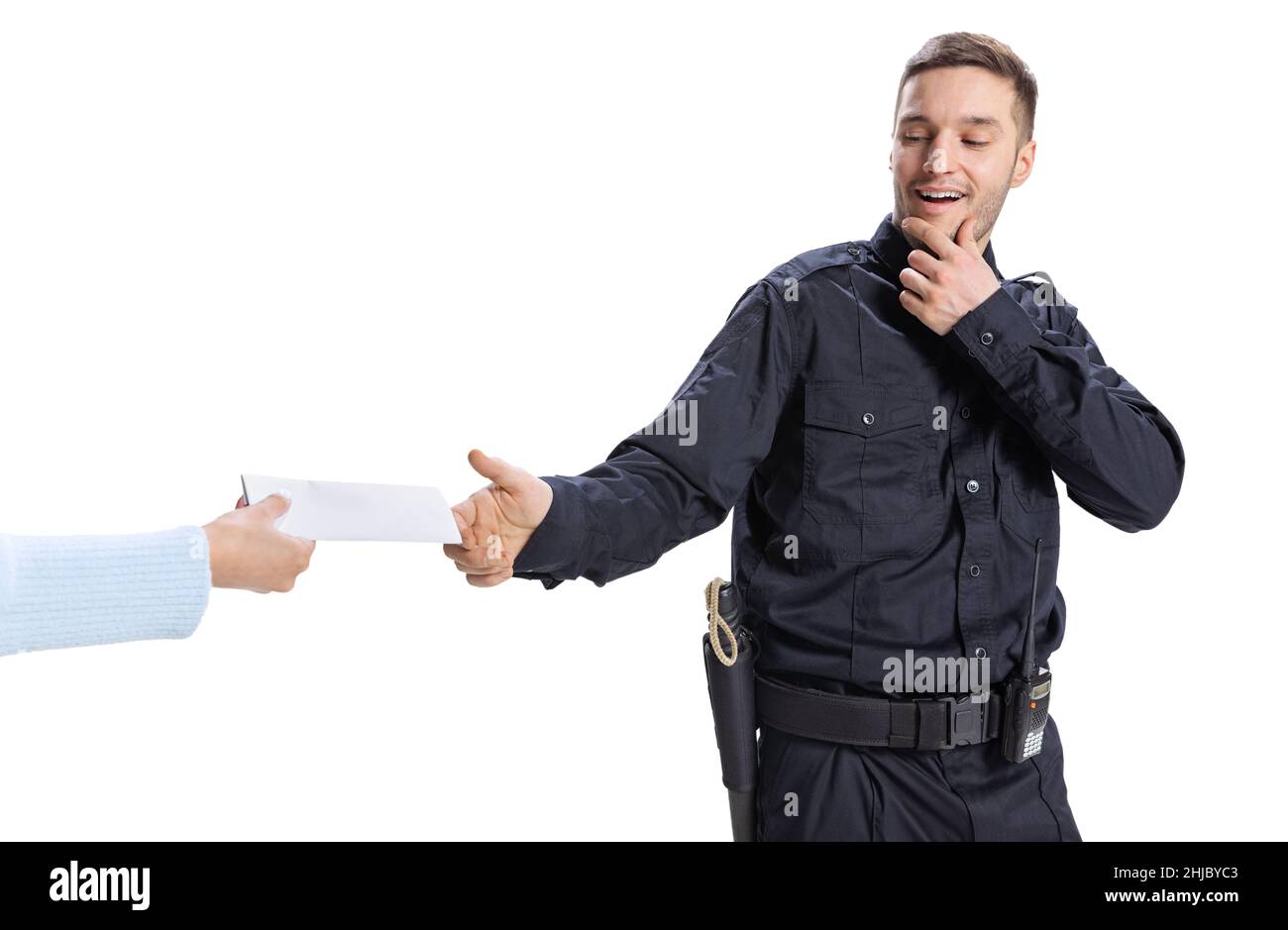 Portrait of young man, policeman wearing black uniform refuses a bribe ...