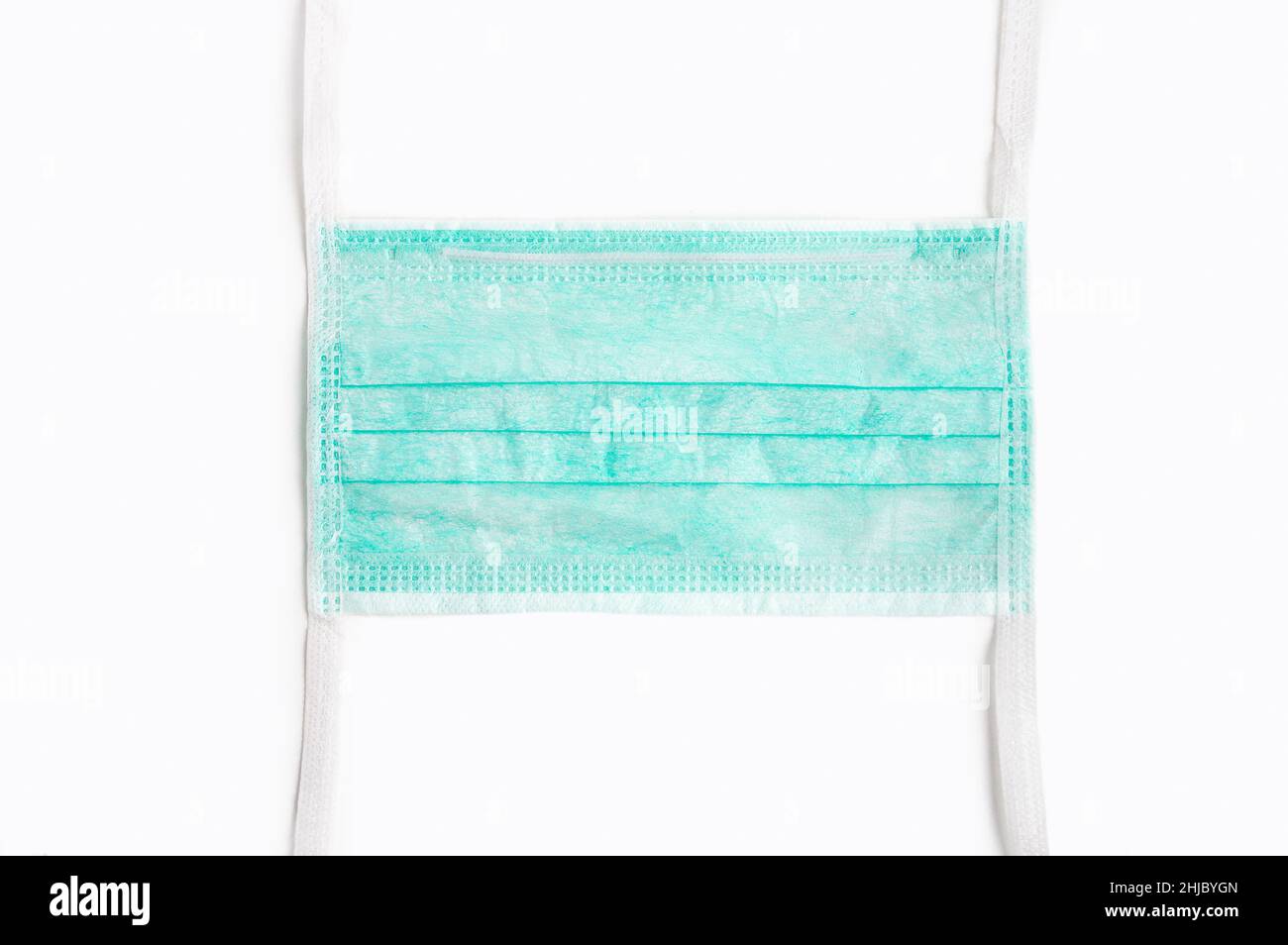 Overhead shot of protective face mask, isolated on white background ...