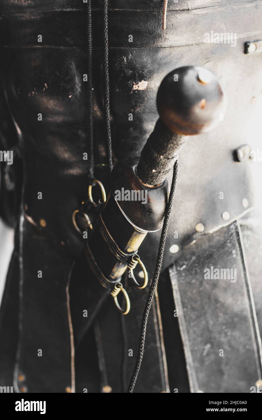 Knight's leather armor and sword. Protective armor. For archive Stock ...