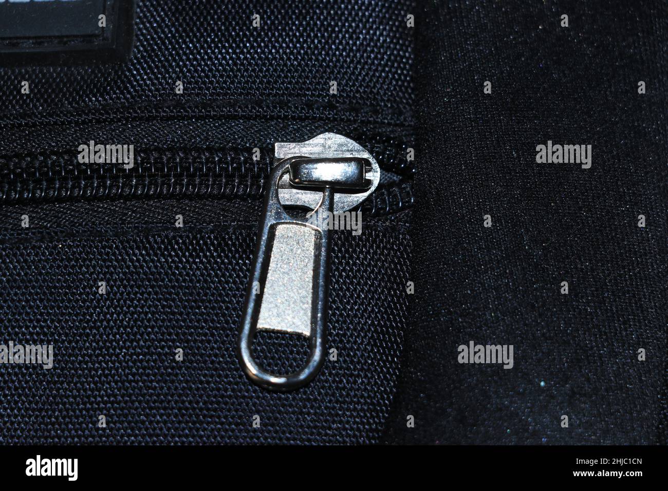 zip close up,beg close up with black background Stock Photo - Alamy