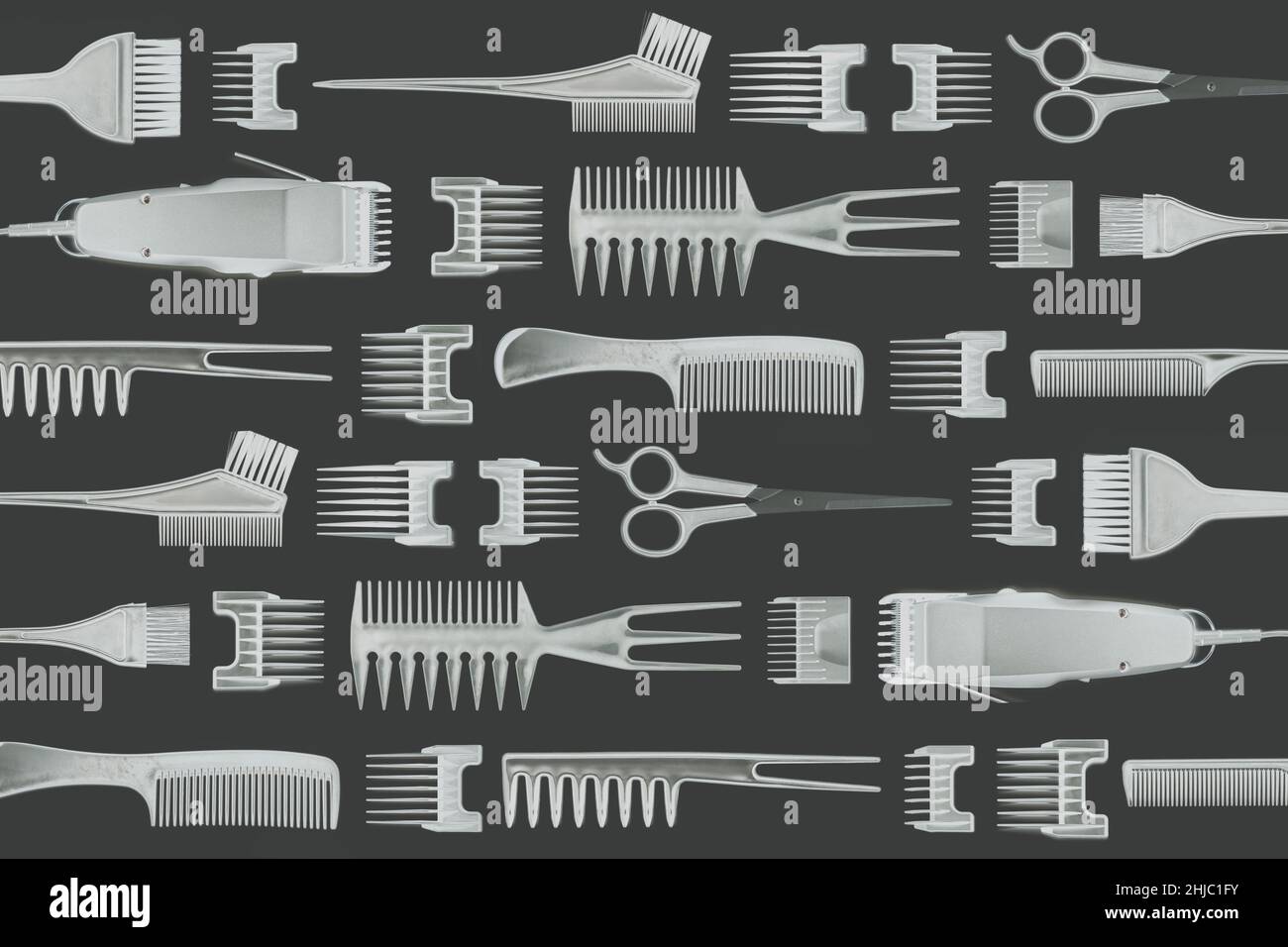 Background from professional hairdressing accessories isolated on dark ...