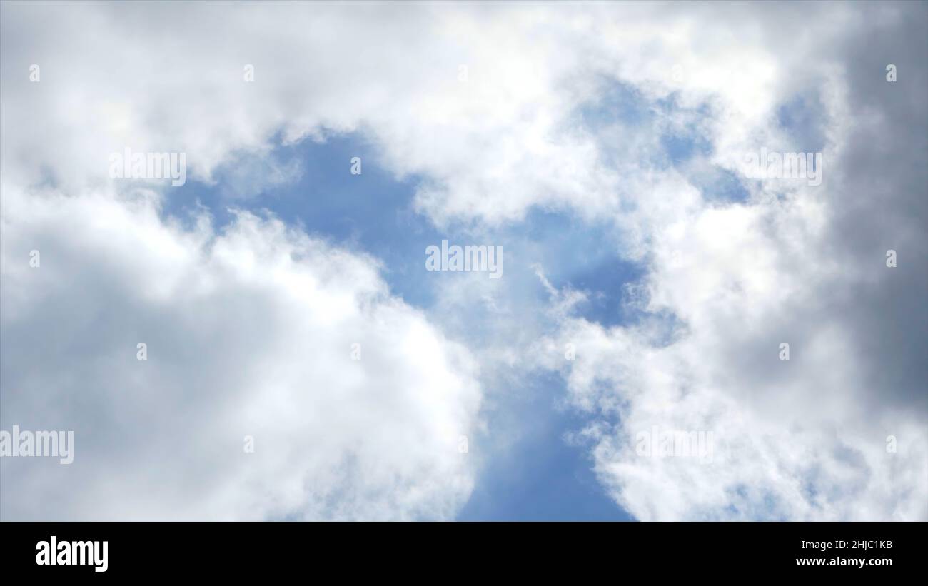 View of blue sky with clouds floating on it. Action. Beauty and ...