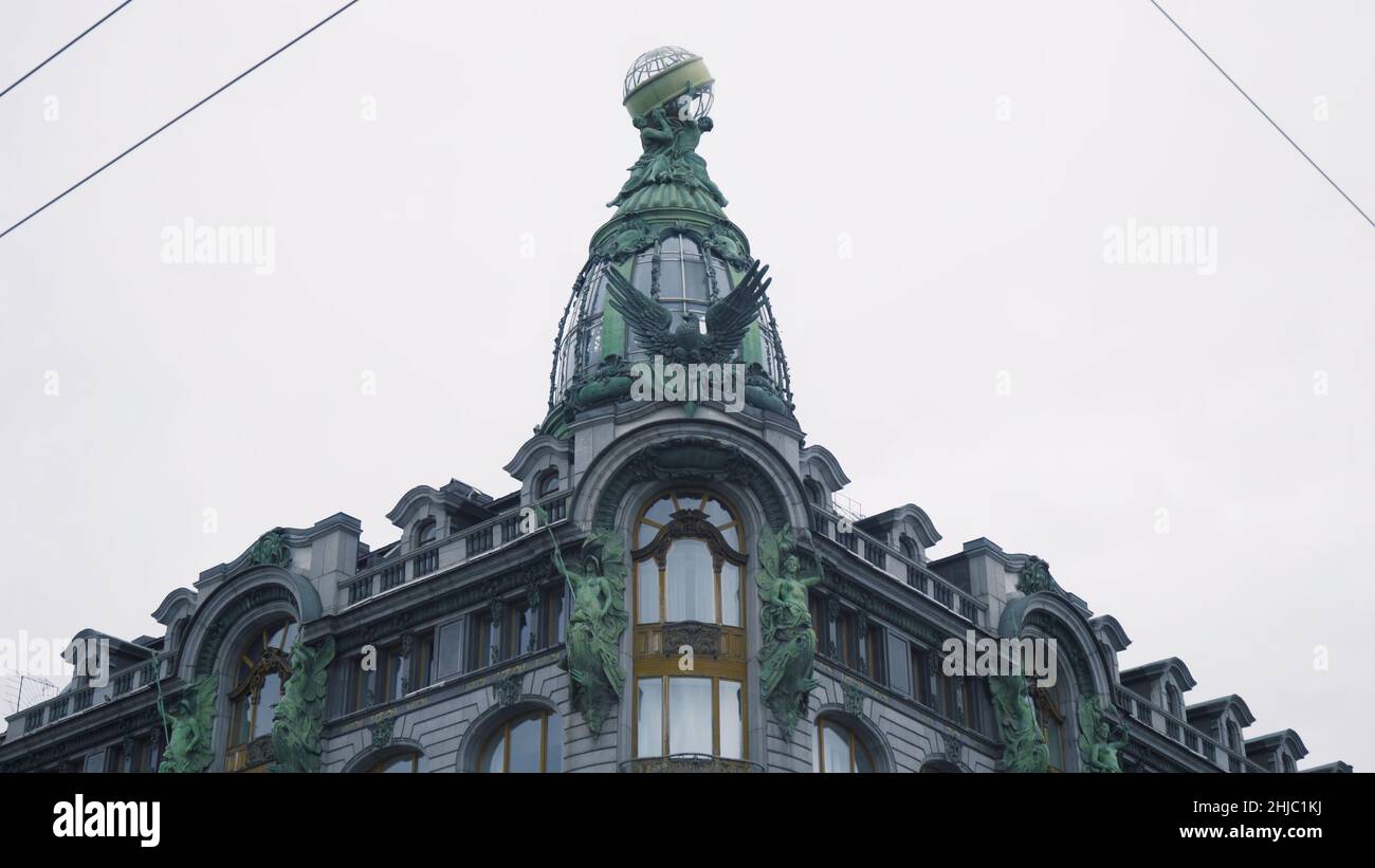 Bottom view of historic city building with greek sculptures. Action ...