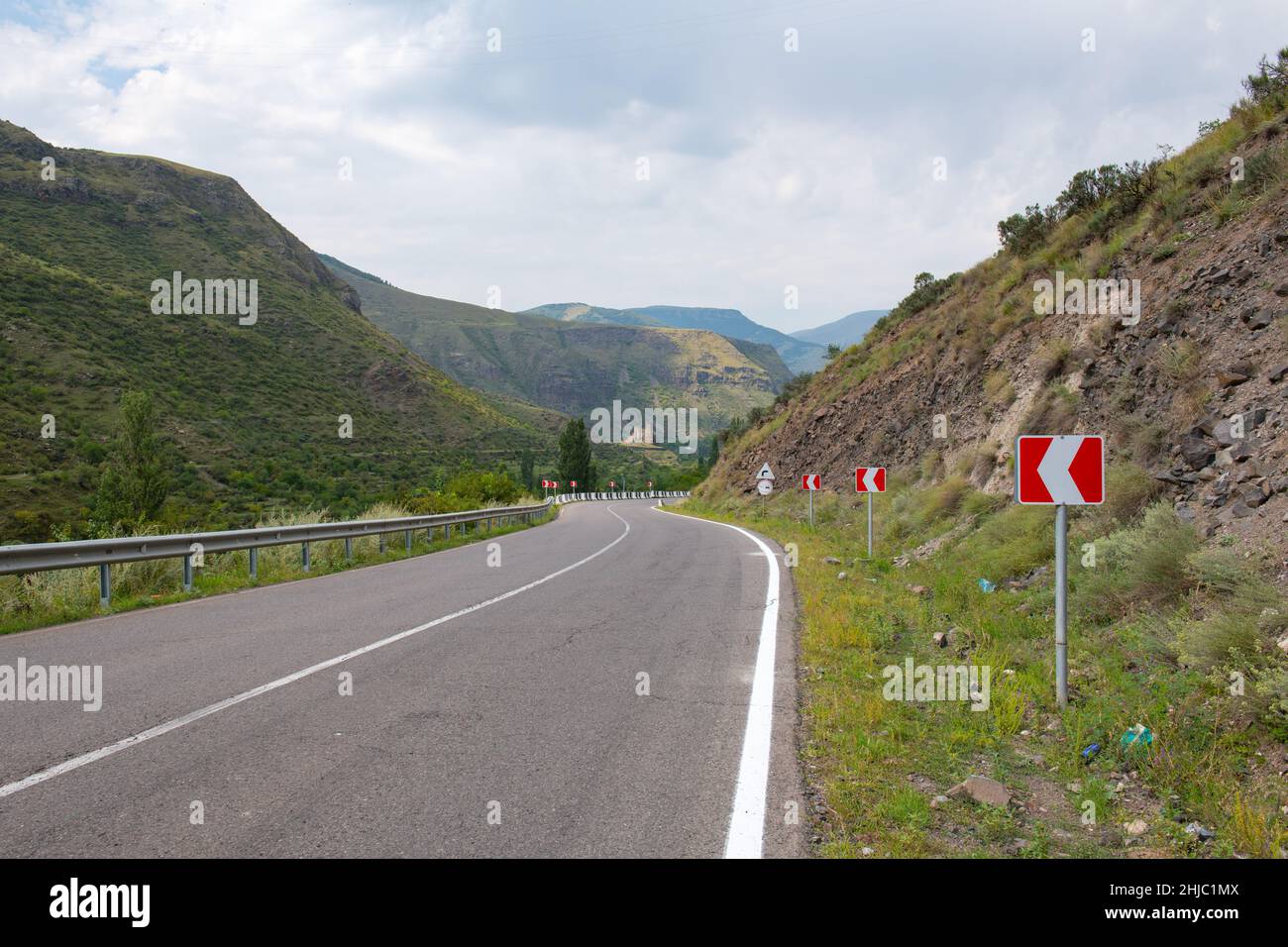 road with markings and without cars in the mountains Stock Photo - Alamy