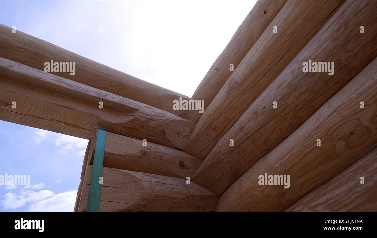 Close-up view of wooden structure of house. Clip. Building house of ...