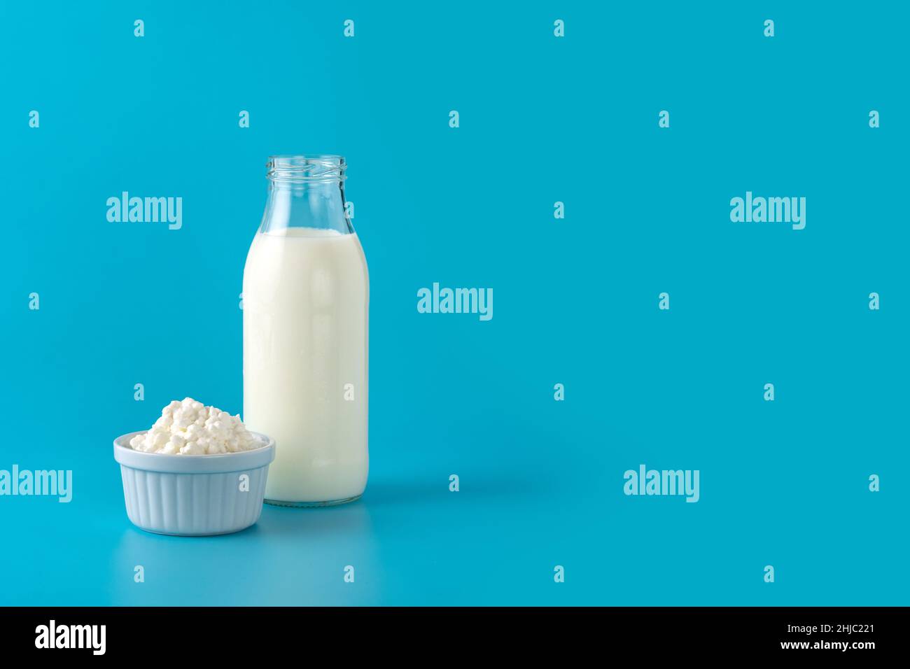Milk kefir drink on wooden table. Liquid and fermented milk product on ...