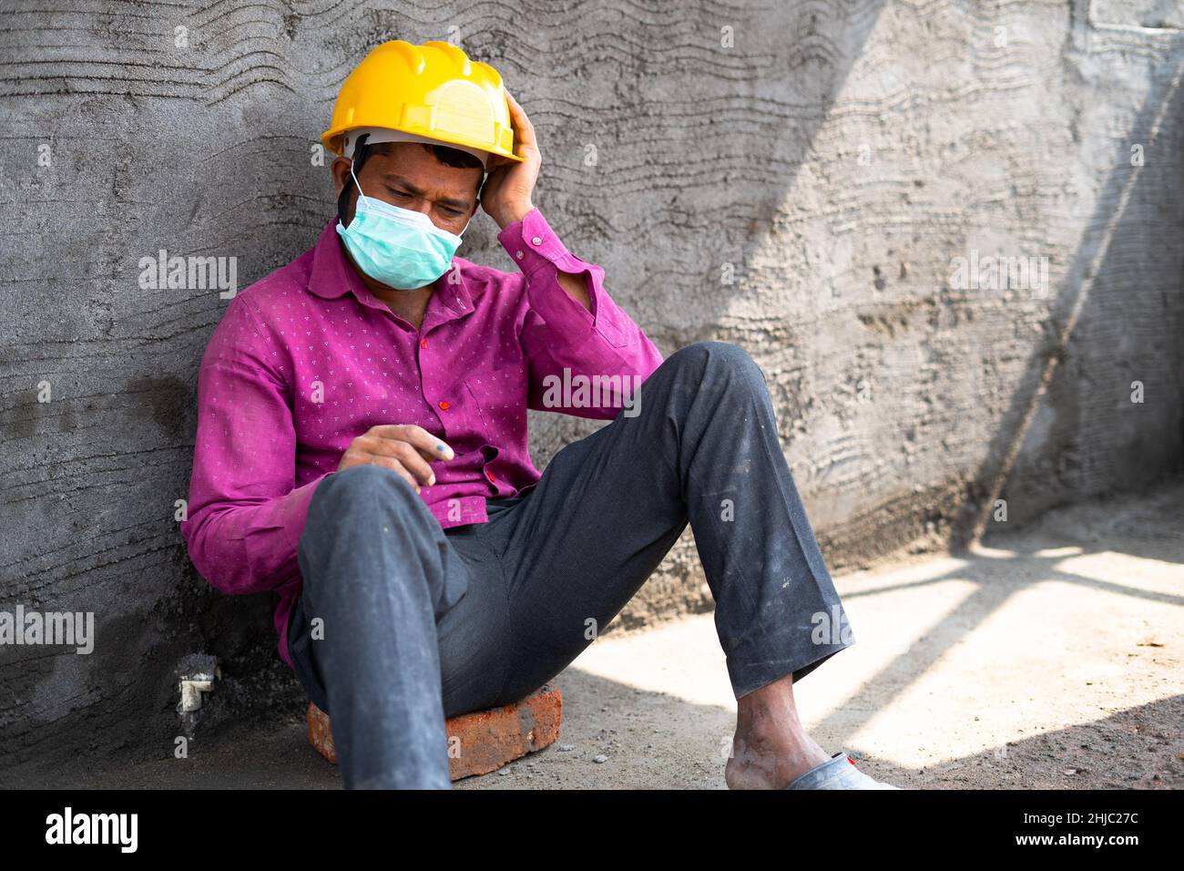 Indian labour sad hi-res stock photography and images - Alamy