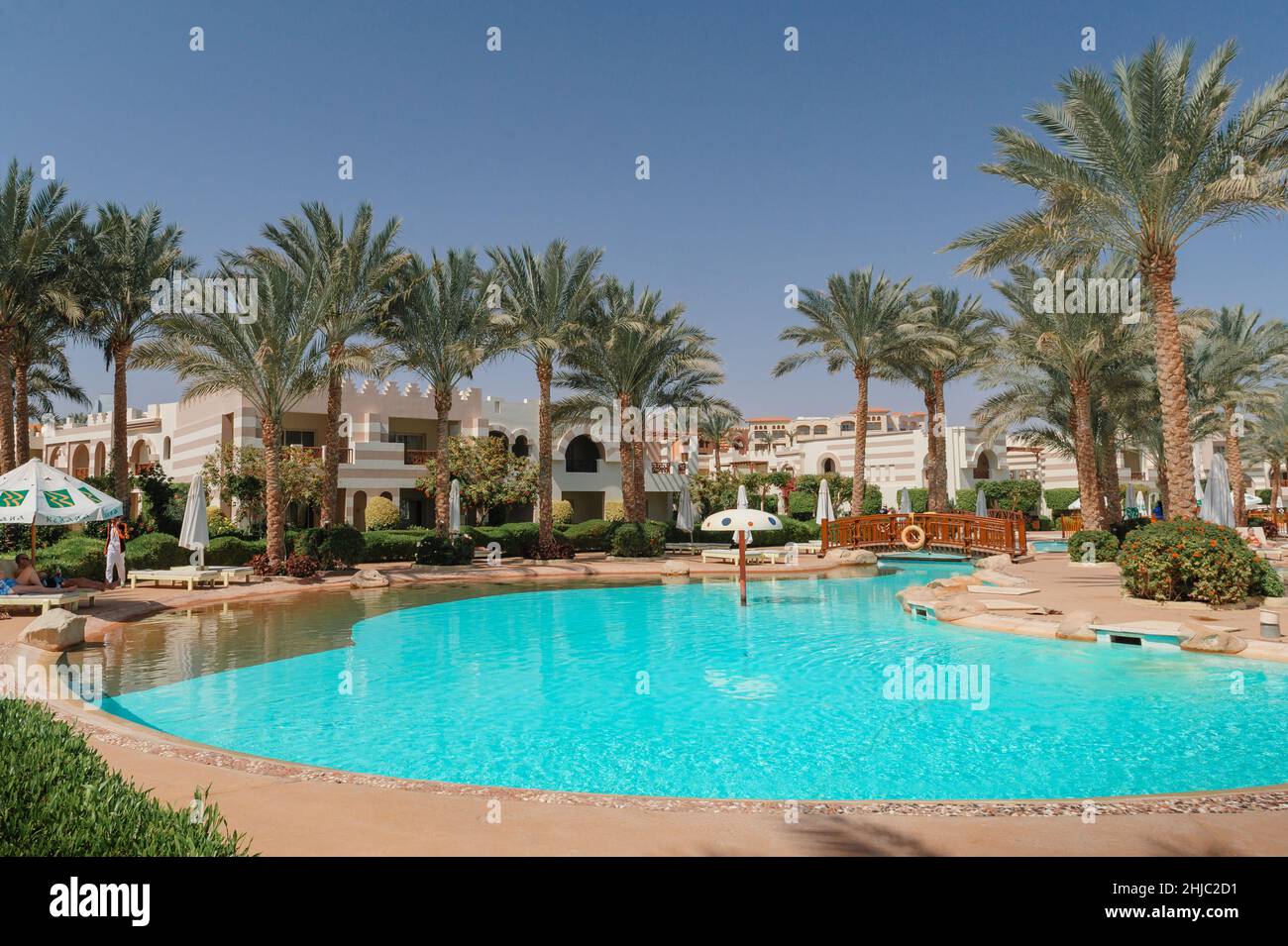 Beautiful swimming pool and palm trees in Egypt Stock Photo - Alamy