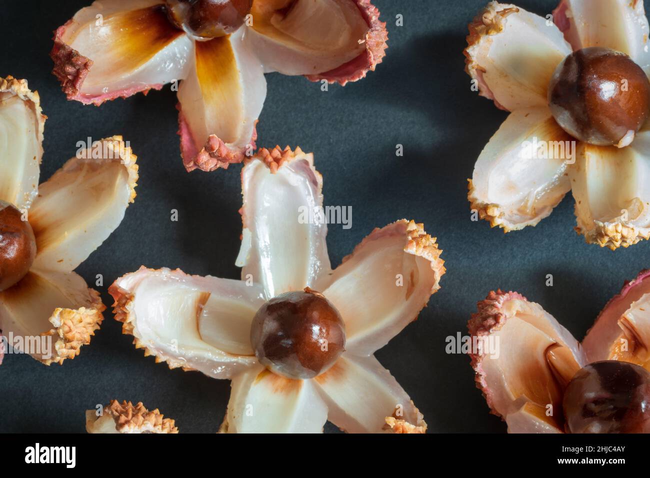 cut open fresh lychee fruit slide pan Stock Photo - Alamy