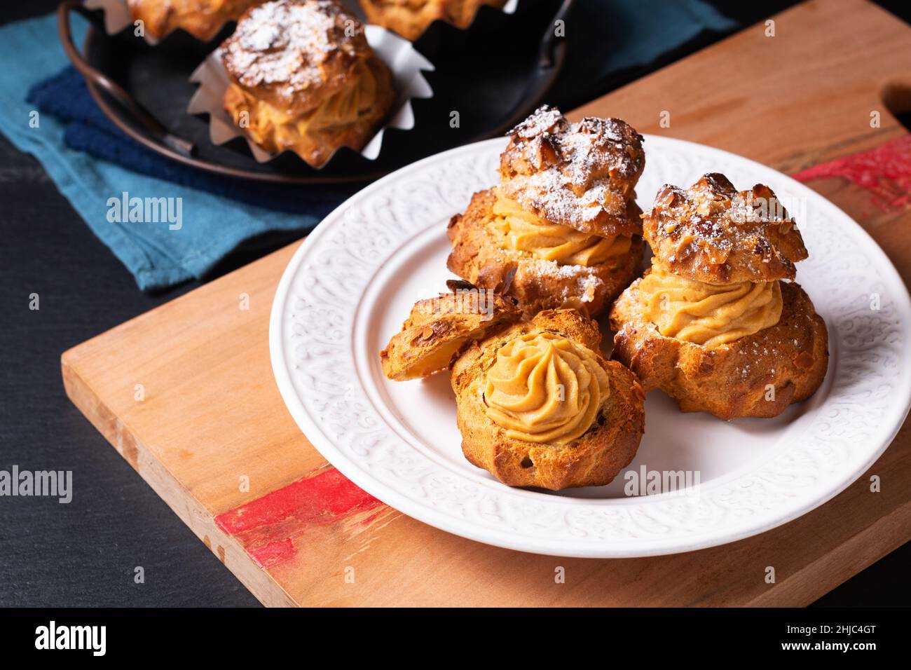 Food concept Homemade Caramel Choux a la cream or Choux cream puffs on ...