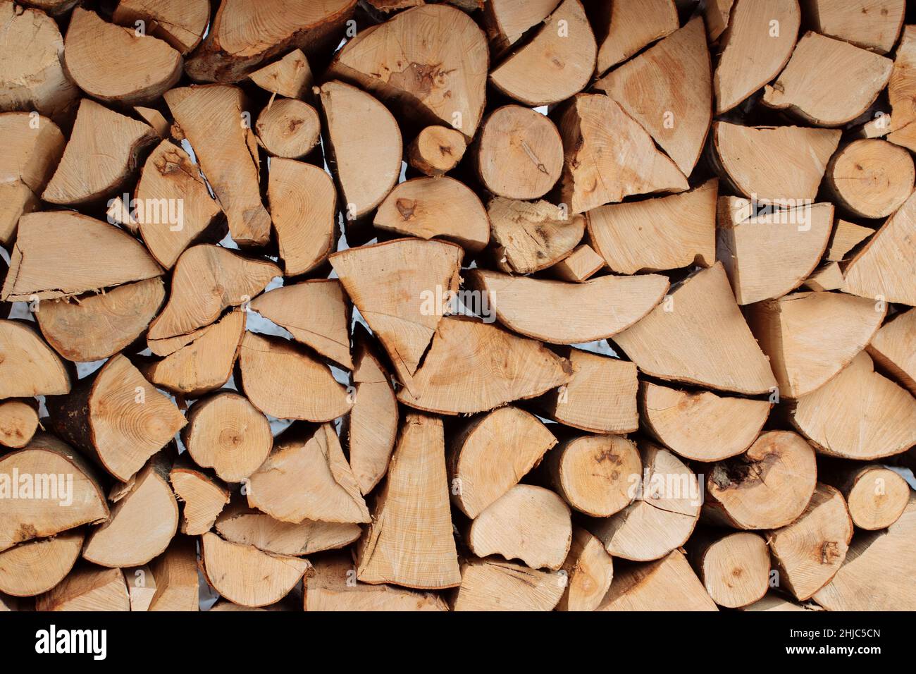 stacked loggs of fire wood texture background Stock Photo - Alamy