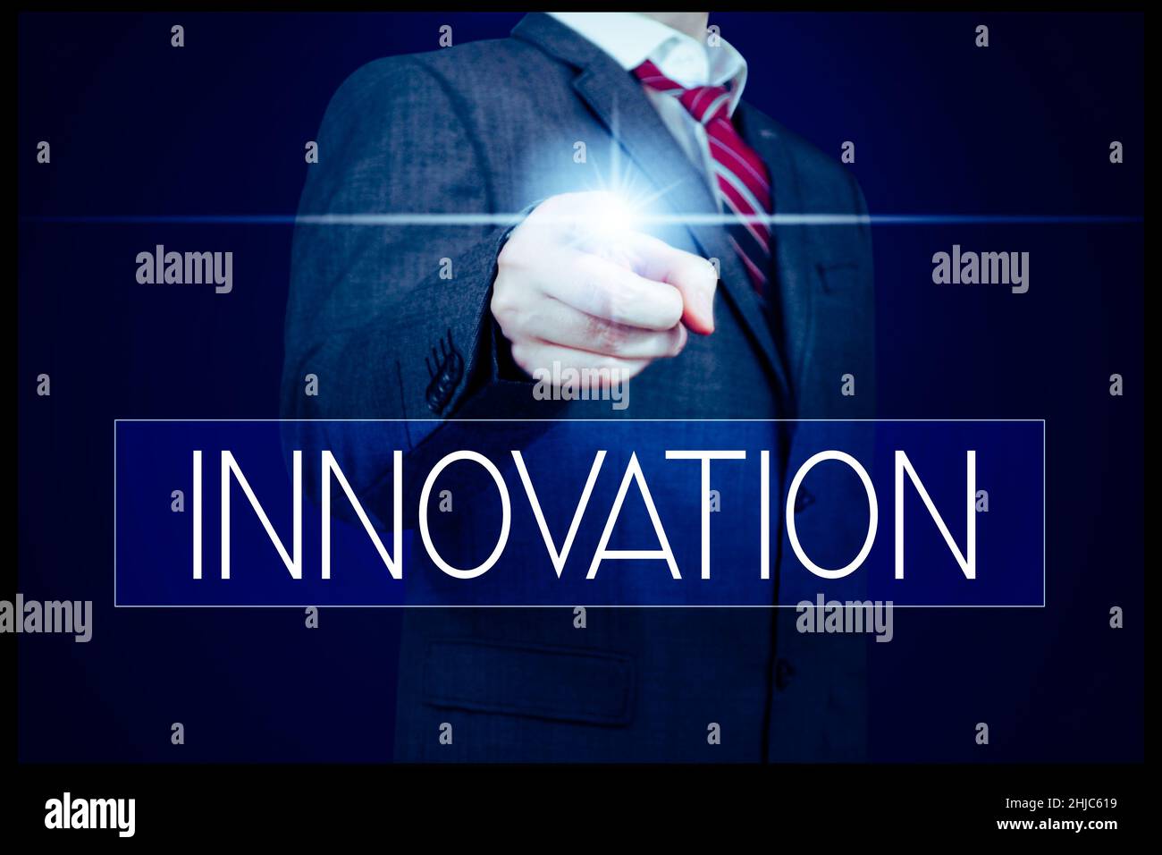 Innovation - lettering, businessman pointing finger Stock Photo - Alamy