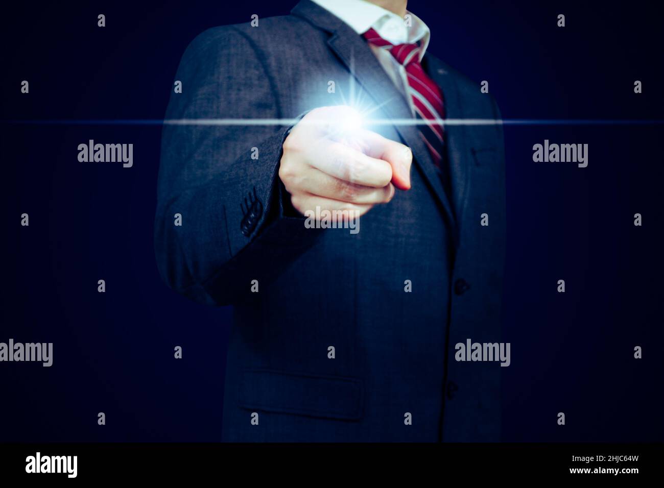 Businessman pointing finger, glow effect Stock Photo - Alamy