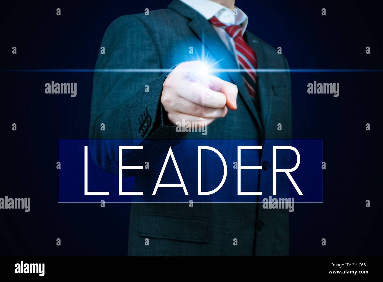 Leader - lettering, businessman pointing finger Stock Photo - Alamy
