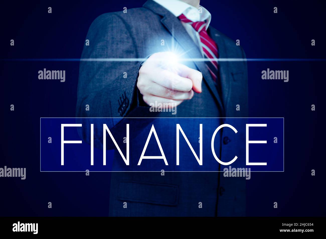 Finance - lettering, businessman pointing finger Stock Photo - Alamy