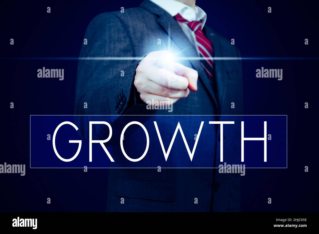 Growth - lettering, businessman pointing finger Stock Photo - Alamy