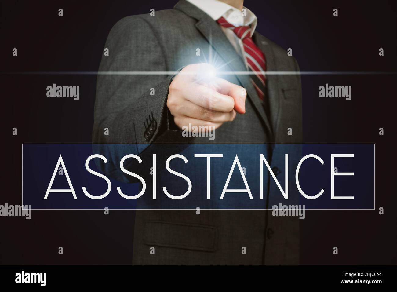 Assistance - lettering, businessman pointing finger Stock Photo - Alamy
