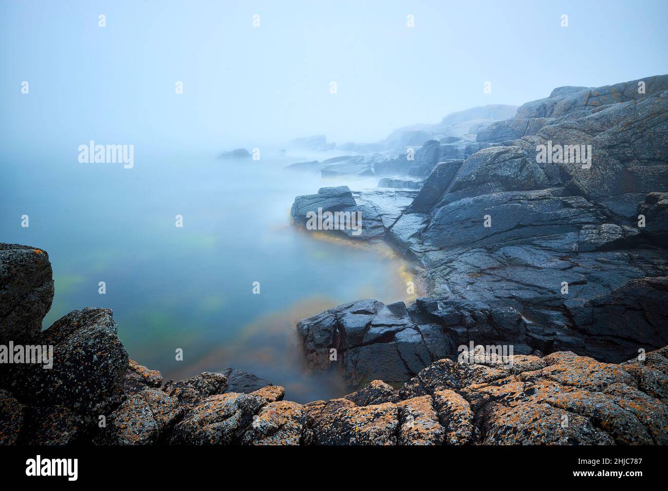 amazing rocks by the shore in danish island Stock Photo - Alamy