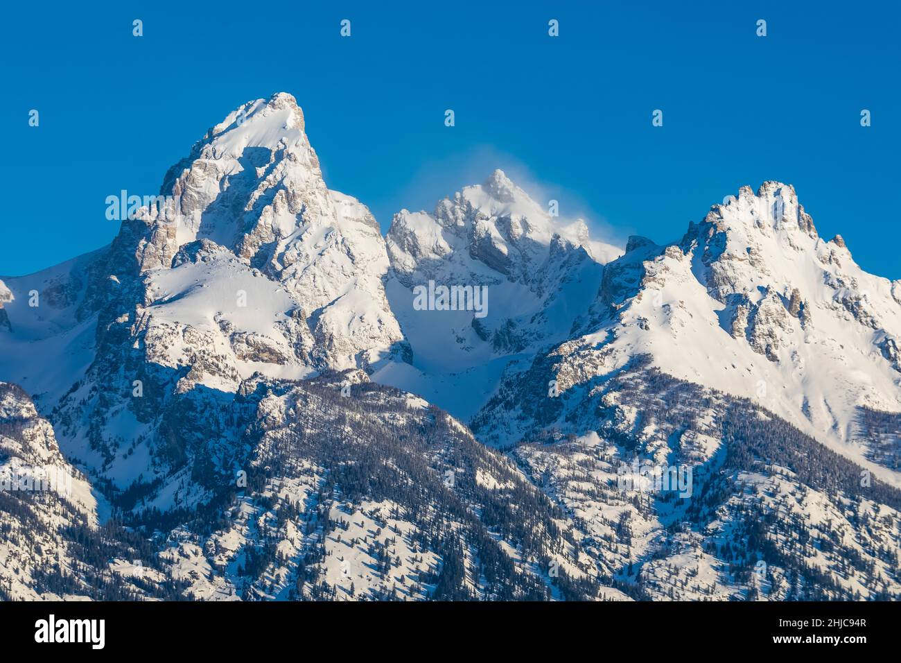 Snow-covered Grand Teton and Mount Owen and Teewinot Mountain in the ...