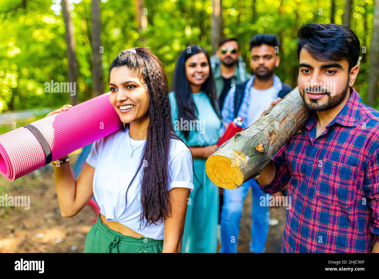 Multiracial pakistanian happy friends at picnic camping park Stock ...