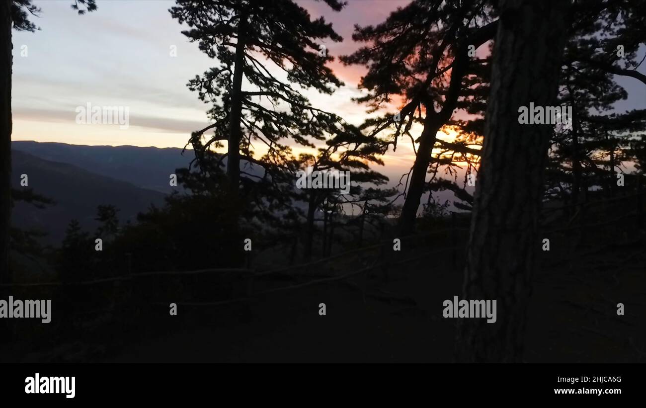 Top view of amazing sunset on sea from mountain. Shot. Aerial view of ...