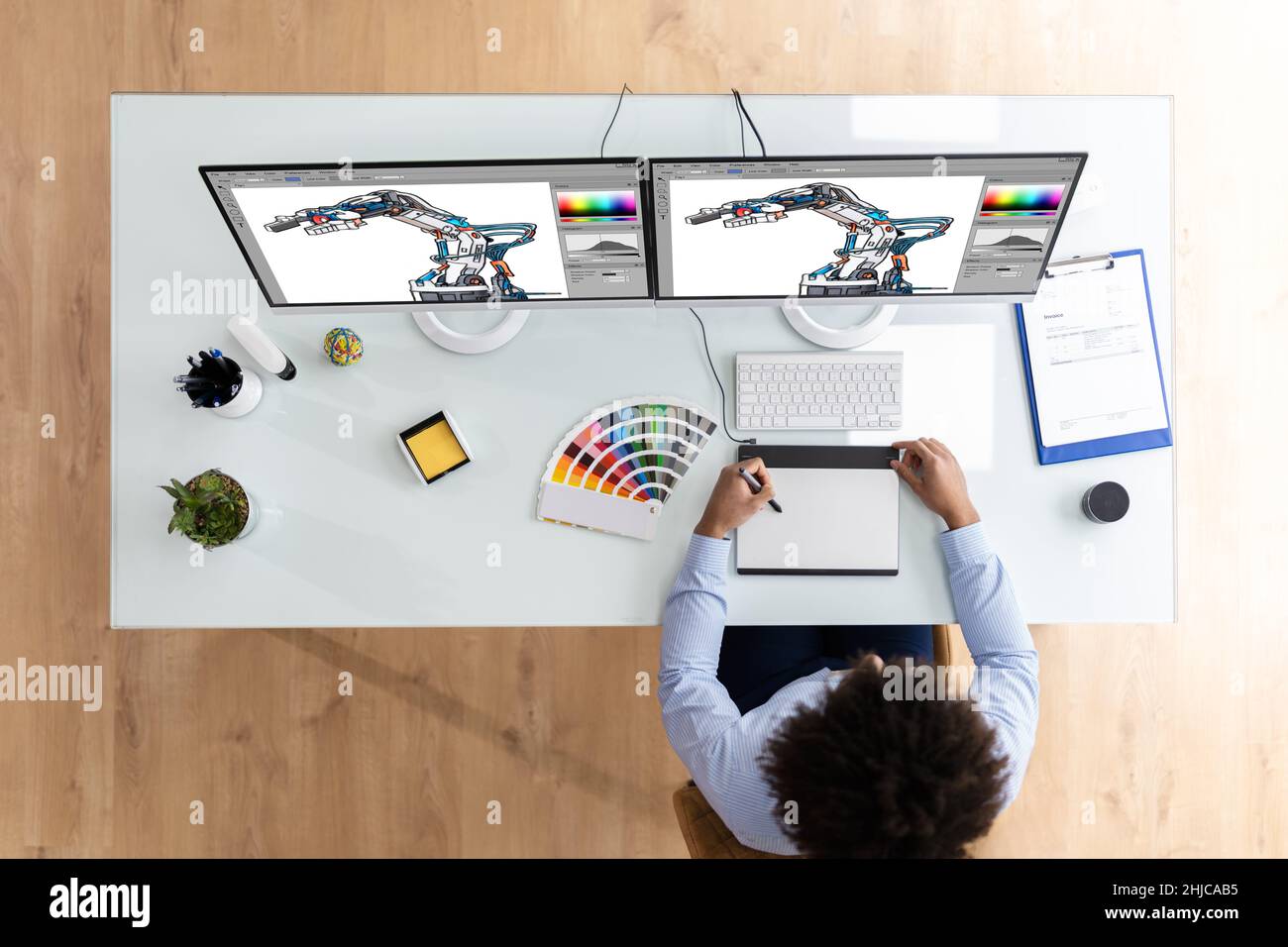 African Graphic Web Designer Using Design Editing Software Stock Photo ...