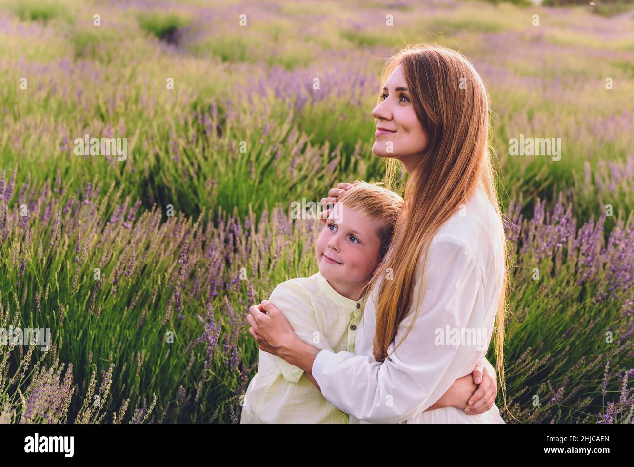 Mother hugging son sad hi-res stock photography and images - Alamy