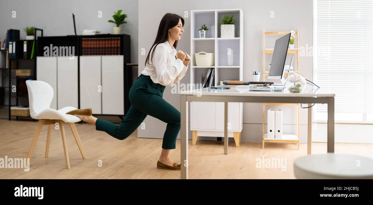 Standing Office Yoga Workout And Workout Near Business Computer Stock ...