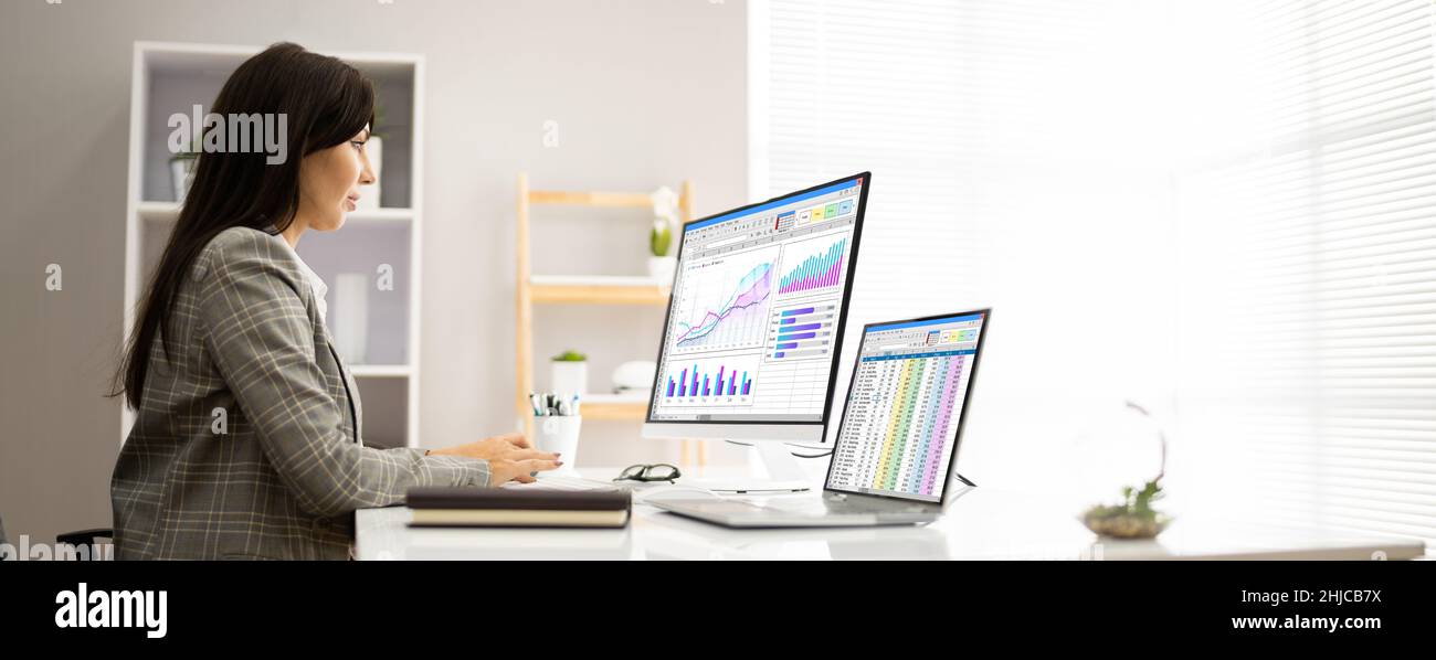 Analyst Employee Working With Spreadsheet On Computer Stock Photo - Alamy