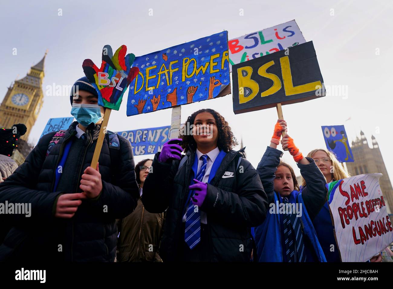 School children take part in a rally in support of British Sign ...