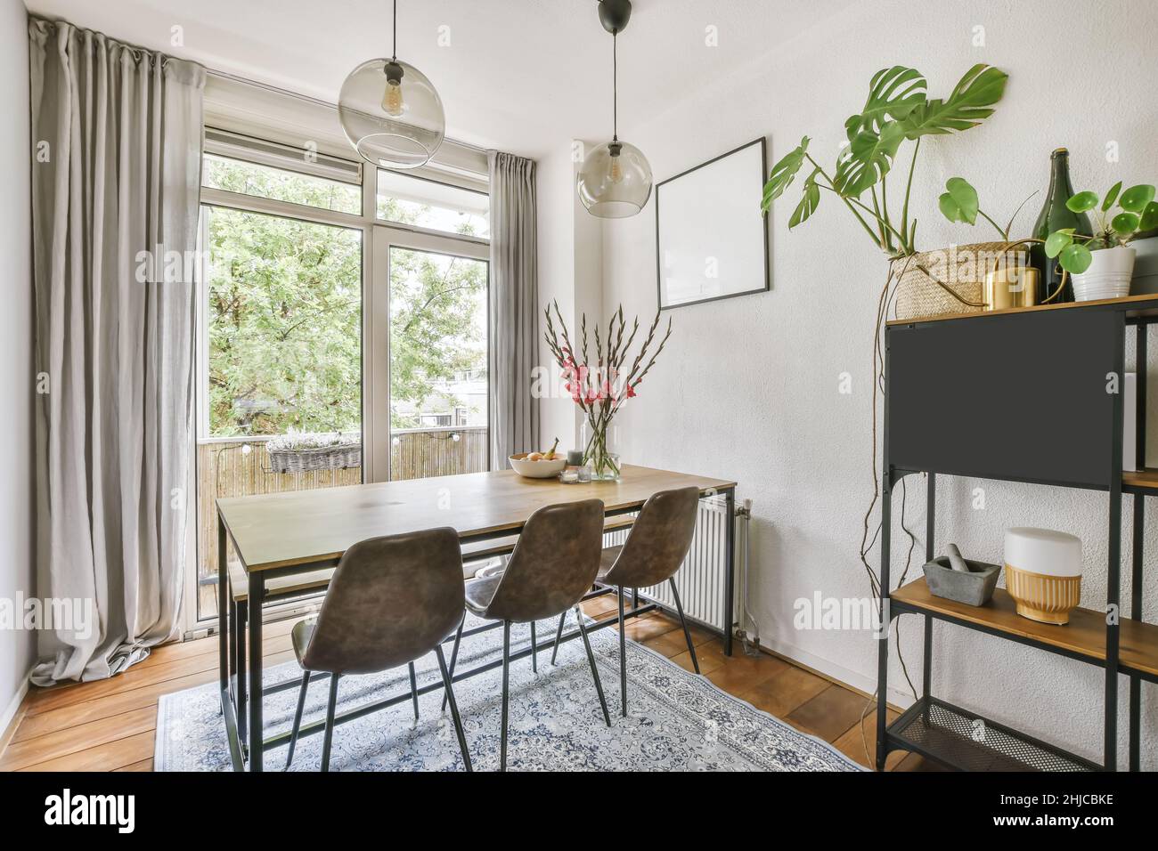 Mind-blowing table in the dining room with a painting on the wall Stock ...