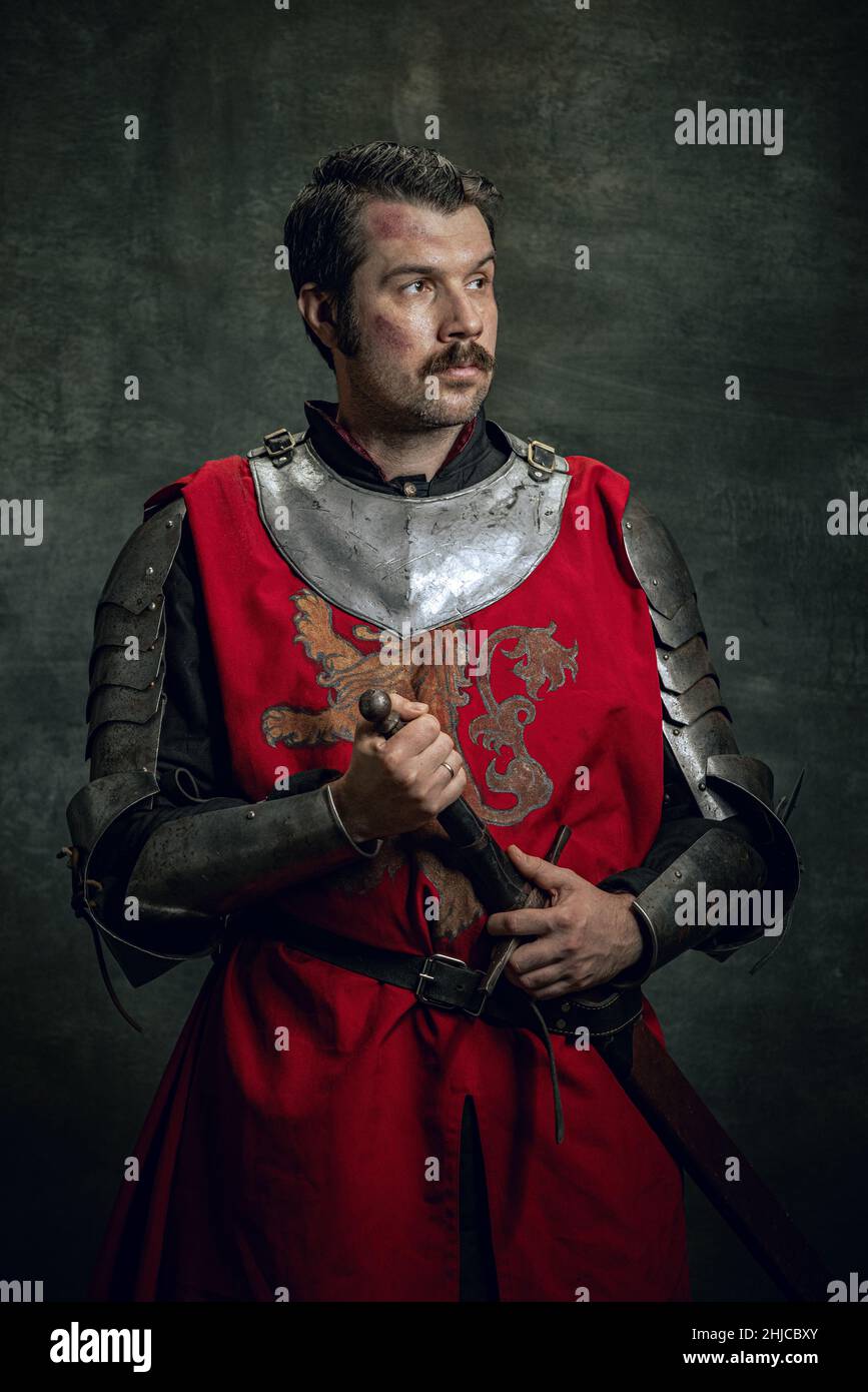 Vintage style portrait of brutal seriuos man, medieval warrior or ...