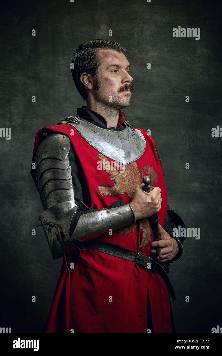 Vintage style portrait of brutal seriuos man, medieval warrior or ...