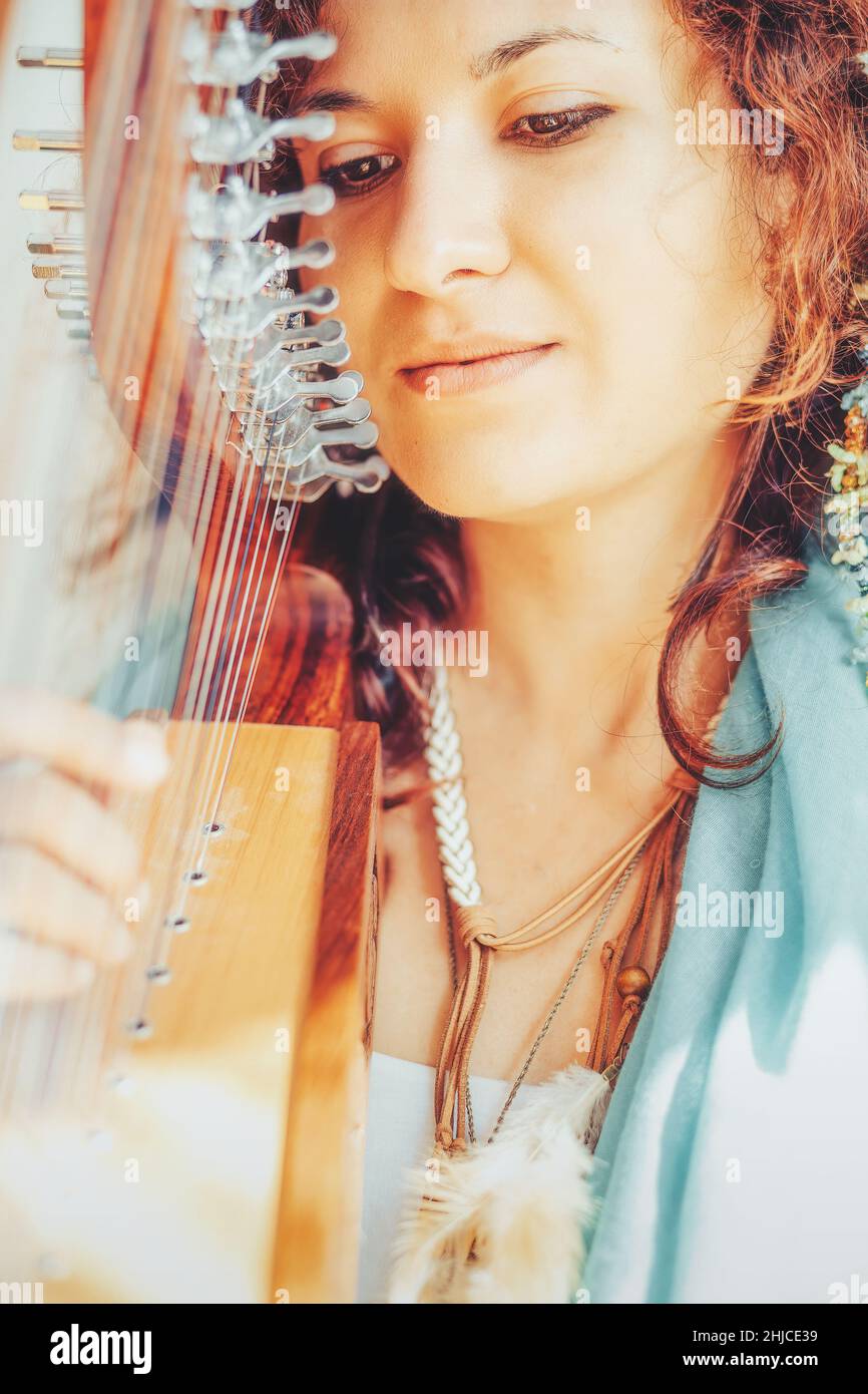 Female woman girl harpist harp playing hi-res stock photography and ...
