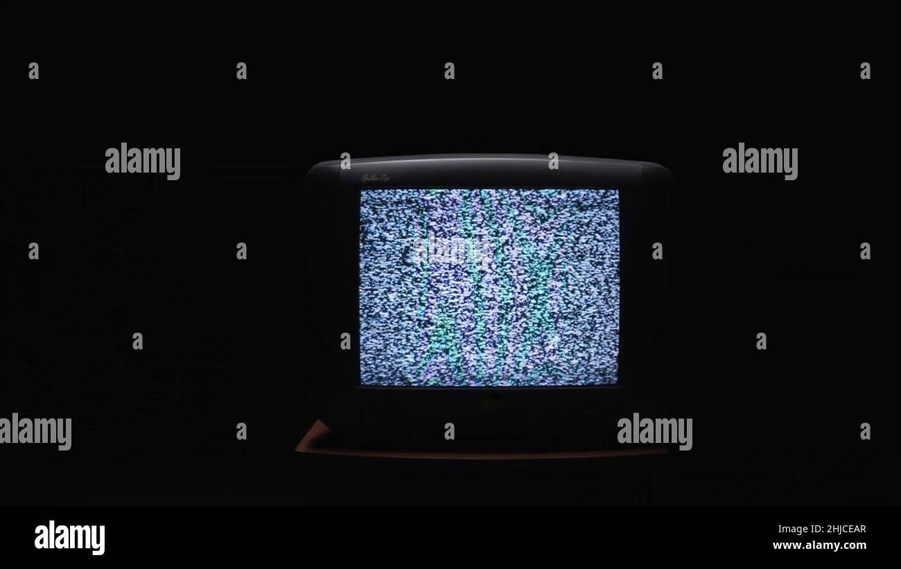 TV screen on at night with a white noise. Stock. Static noise on the ...