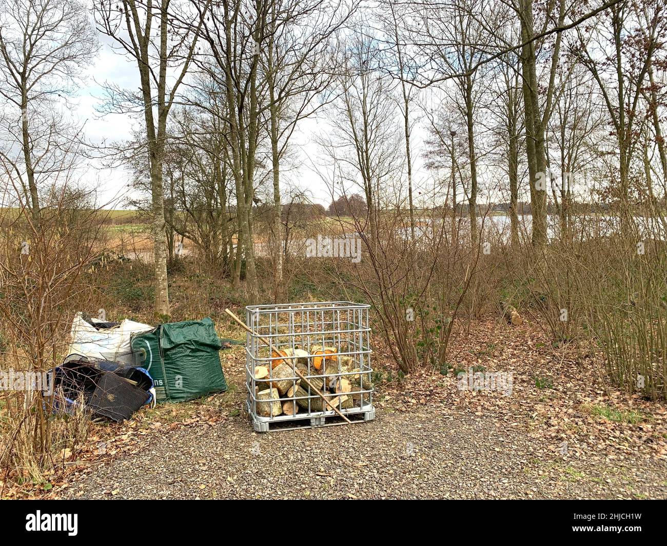 Sywell Country Park Northamptonshire UK log logs in a cage cut trees ...