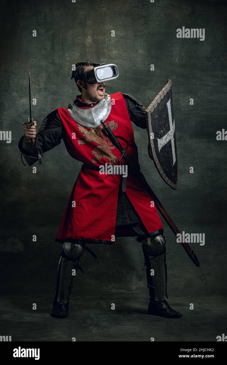 Portrait of man, medieval warrior, knight with dirty wounded face in VR ...